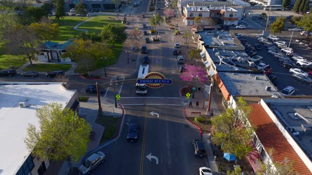 Aerial footage of Chula Vista and Thrid Avenue Sign in Downtown with ...